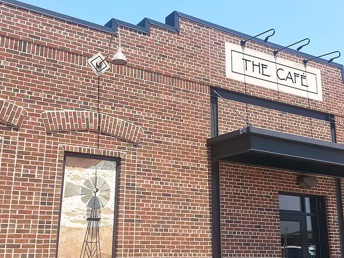 The unassuming brick exterior of The Café speaks volumes – greatness doesn't need neon signs or flashy gimmicks, just consistently excellent food.