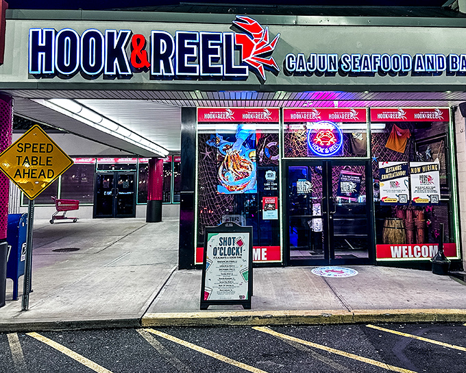The neon glow of Hook & Reel's storefront beckons seafood lovers like a lighthouse calling ships to shore. A culinary treasure hiding in plain sight.