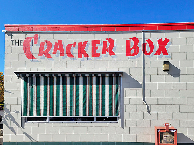 That bold red lettering against white cinderblock isn't just signage—it's a beacon for breakfast pilgrims seeking refuge from chain restaurant mediocrity.