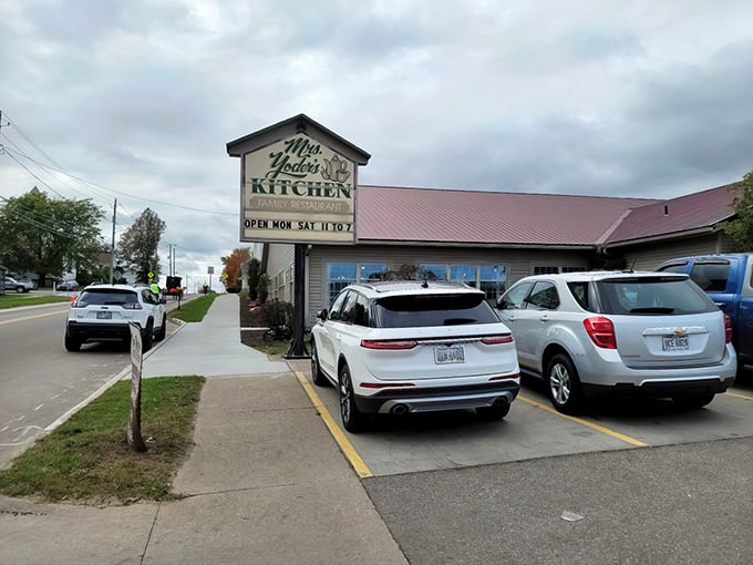 The welcoming facade of Mrs. Yoder's Kitchen stands ready to rescue hungry travelers on Ohio's backroads.