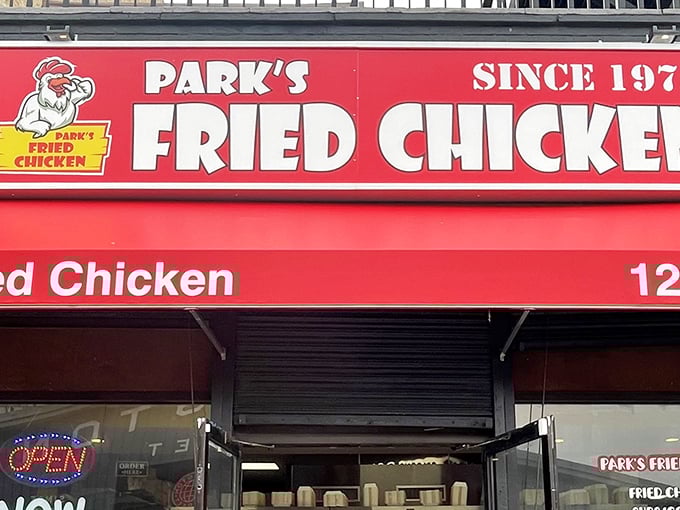The bright red storefront of Park's Fried Chicken stands out like a beacon to hungry Baltimoreans. This is where fried chicken dreams come true.