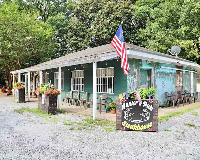 The unassuming green exterior of Hunter's Pub & Steakhouse proves once again that culinary treasures often hide in plain sight. That American flag isn't just patriotic—it's a beacon for hungry travelers.