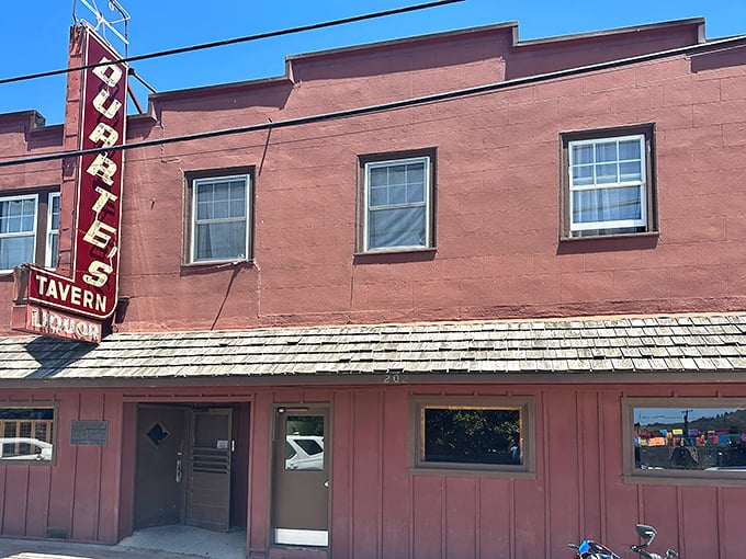The deep red facade of Duarte’s Tavern stands like a culinary beacon on Pescadero’s main street, its vintage neon sign calling out to hungry travelers.
