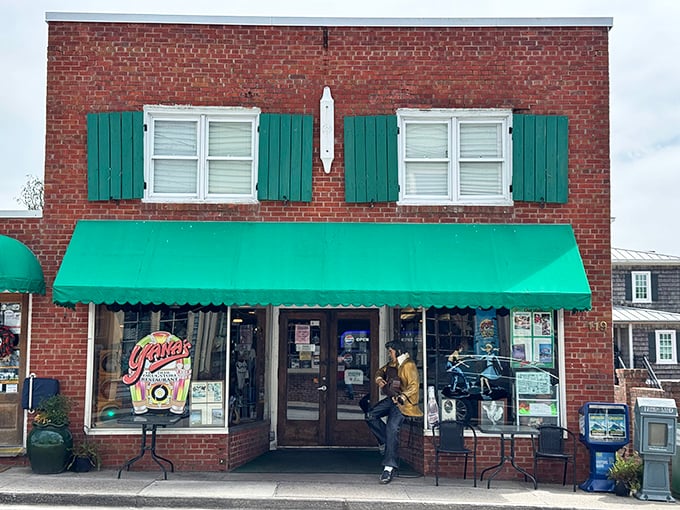 The green awning beckons like a breakfast lighthouse, guiding hungry souls to their morning salvation in downtown Swansboro.