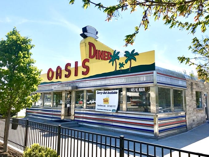 That sunshine-yellow facade isn't just a building—it's a time machine disguised as a diner, beckoning hungry travelers with the promise of comfort food paradise.