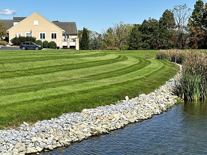 Perfectly striped lawns meet serene waters at Arbor Gate. Retirement living where the grass is literally greener on this side of the fence.