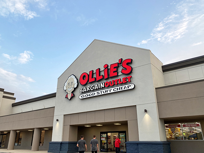 The iconic red Ollie's sign beckons like a lighthouse for the bargain-obsessed. "Good Stuff Cheap" isn't just a slogan—it's a solemn promise.