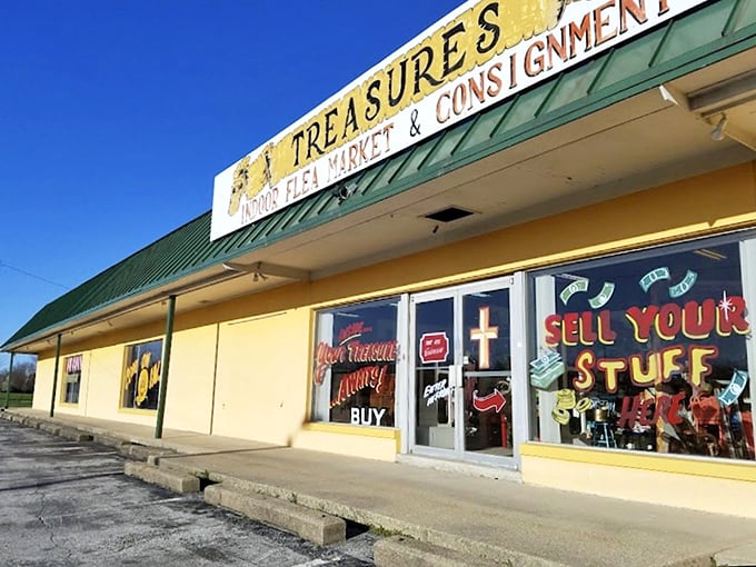 The unassuming yellow exterior of Treasures Indoor Flea Market promises adventure within—like finding the world's best taco stand in a gas station parking lot.