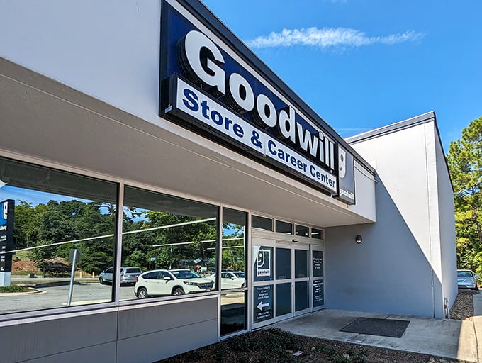 The unassuming exterior of Birmingham's Goodwill Outlet Store—like finding a treasure map disguised as a regular building.