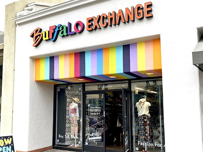 The rainbow-striped awning of Buffalo Exchange isn't just eye-catching—it's a beacon for bargain hunters seeking fashion gold in Pasadena.