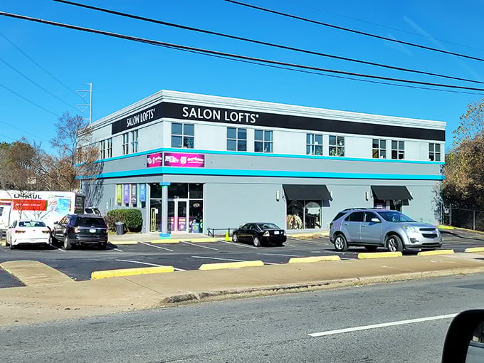The blue and pink exterior of Out of the Closet stands out like a fashionable beacon on Piedmont Avenue, promising treasures within its walls.