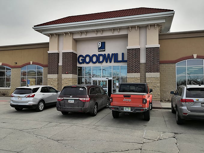 Another angle of thrift paradise – where SUVs and pickup trucks gather like prospectors at a gold rush, their owners inside mining for bargains.