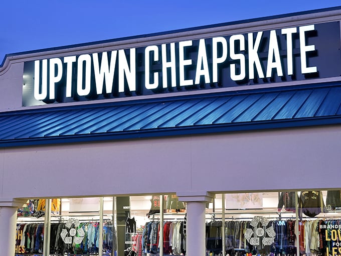 The iconic blue-trimmed storefront of Uptown Cheapskate glows like a beacon for bargain hunters in Lexington's retail landscape.