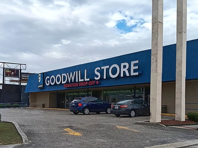 The blue-roofed bargain paradise beckons shoppers with its bold signage and promise of treasures waiting inside.