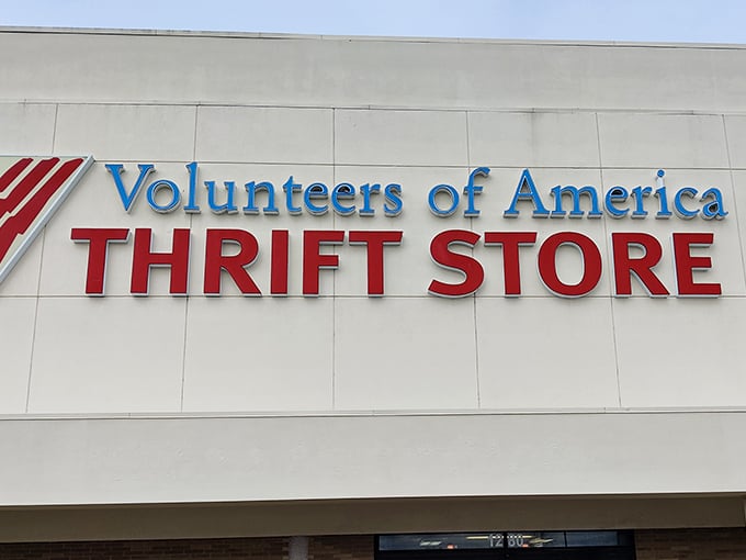 Bold blue letters against crisp white – the thrift store's façade promises treasures within, no password required.