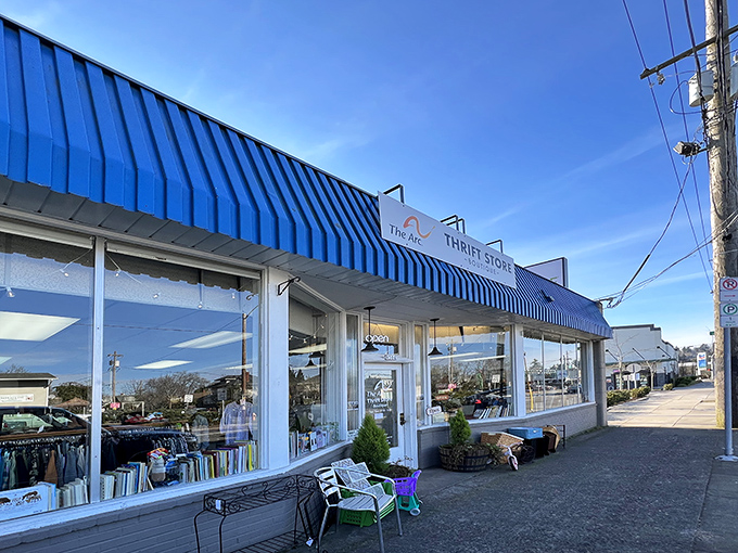 The Arc's cheerful blue awning beckons treasure hunters like a beacon of bargain possibilities. Step inside—your next conversation piece awaits.