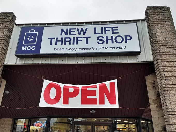 The blue and white sign promises more than bargains—it's a gateway to guilt-free retail therapy where every purchase helps someone else.
