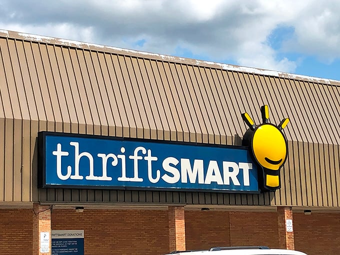 The cheerful yellow lightbulb logo welcomes bargain hunters like a beacon of thrifty hope against Nashville's sky.