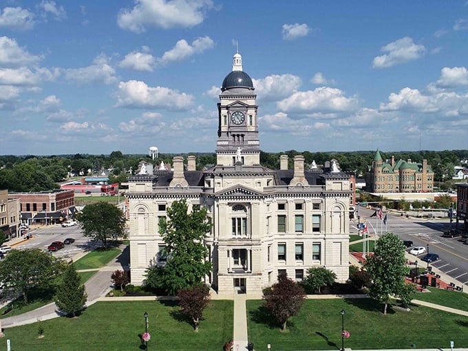 The Clinton County Courthouse stands like a limestone sentinel, its clock tower keeping watch over Frankfort's charming downtown where time seems to move at a more civilized pace.