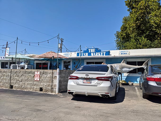 The Fish Market's unassuming exterior hides culinary treasures within – proof that in Missouri, seafood paradise can exist in a humble white building with blue trim.