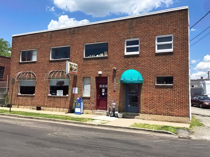 That turquoise awning isn't just decoration – it's a promise that something wonderful awaits inside this unassuming Richmond treasure.