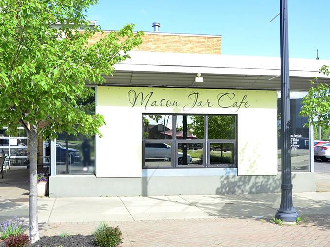 The bright, welcoming facade of Mason Jar Café stands out like a breakfast beacon in Benton Harbor’s Arts District, inviting you in for comfort food done right.