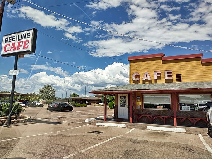 The sunshine-yellow exterior of Beeline Cafe stands like a beacon of breakfast hope against Arizona's blue sky, promising comfort food salvation to weary travelers.