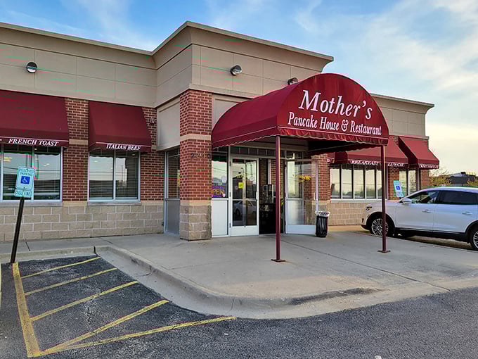 The iconic red awning of Mother's Pancake House beckons like a culinary lighthouse, promising comfort food that'll make you forget all your adulting responsibilities.