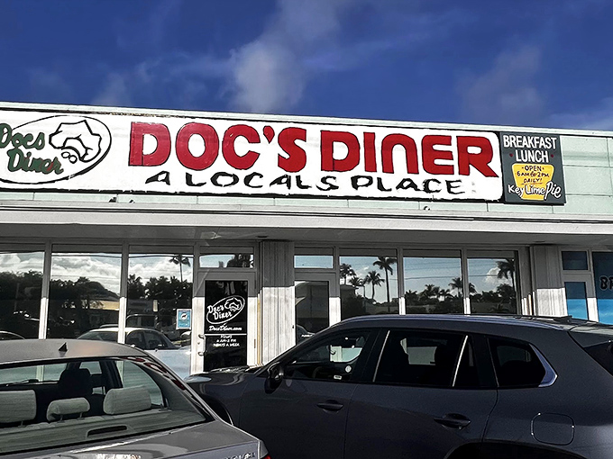 The unassuming storefront of Doc's Diner proudly declares itself "A Local's Place" – the Keys equivalent of finding the secret password to culinary paradise.