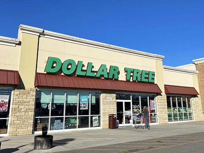 The iconic green Dollar Tree sign against a bright blue Tennessee sky promises treasure hunting adventures where every item costs just a buck.
