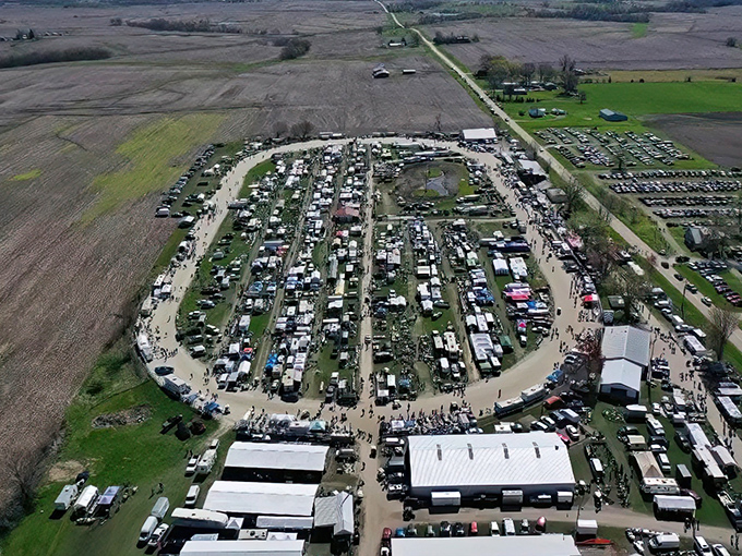 An aerial view that reveals the true scale of What Cheer Flea Market—like a small city dedicated entirely to the art of the deal.