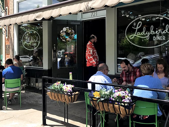 The sidewalk seating at Ladybird Diner isn't just charming—it's where Lawrence locals gather to debate Jayhawks basketball while waiting for pie that's worth every minute.