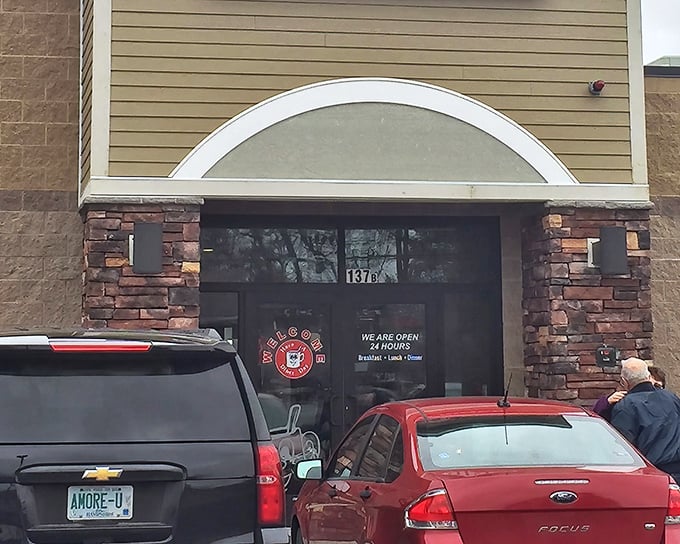 The unassuming exterior of Red Arrow Diner hides culinary treasures within – like finding a Michelin star behind a humble doorway.