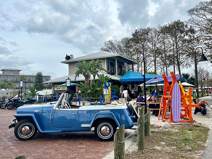 Classic Florida beach vibes meet lakeside charm. That vintage Jeepster parked out front is the automotive equivalent of the restaurant's personality – laid-back and nostalgic.