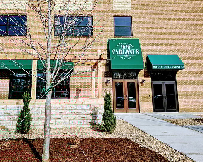 Jo Jo Carloni's welcomes you with distinctive green awnings and warm brick façade – like an Italian grandmother beckoning you in for Sunday dinner.