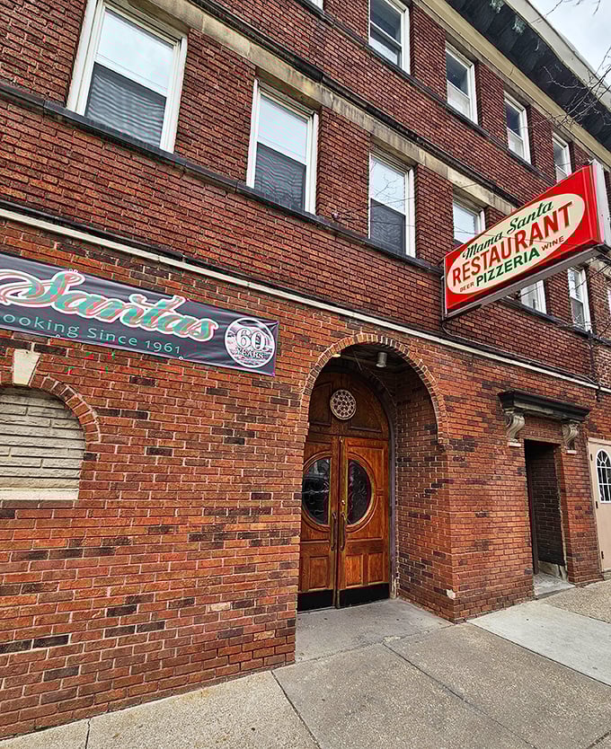 The brick facade of Mama Santa's stands like a time capsule on Mayfield Road, its vintage sign promising Italian comfort that Cleveland has embraced for generations.
