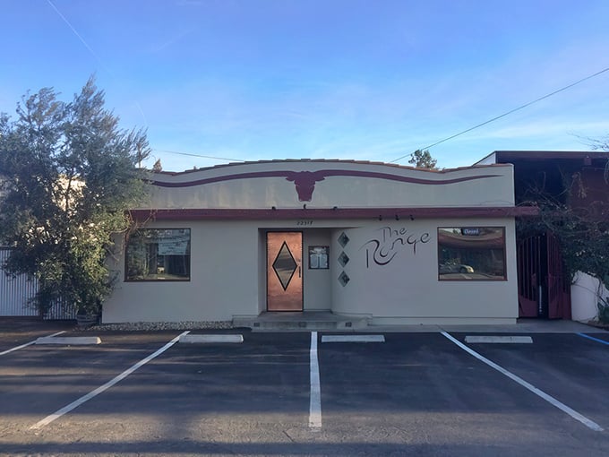 That longhorn silhouette isn't just decoration—it's a promise of what awaits. The Range's modest façade is Central Coast's version of a secret handshake.