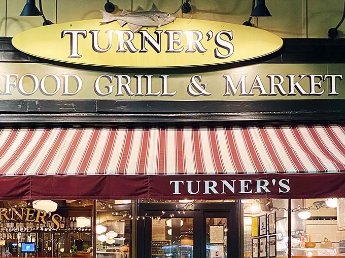 That red and white striped awning isn't just decoration – it's a beacon calling you home to serious seafood.