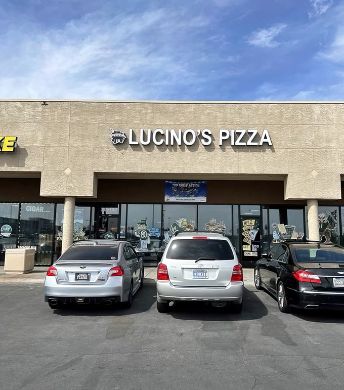 The desert sun bounces off Lucino's simple exterior, a pizza oasis where locals' parked cars tell the real story – this place is worth finding.