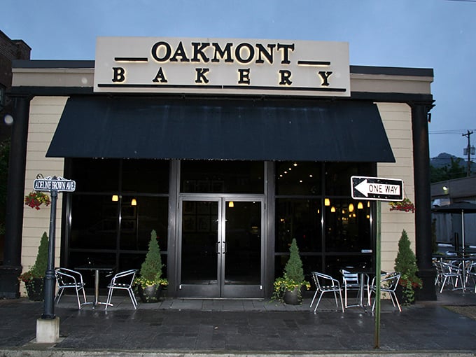 The classic storefront beckons like an old friend, promising sweet reunions under that iconic black awning. Oakmont's exterior is both invitation and promise.