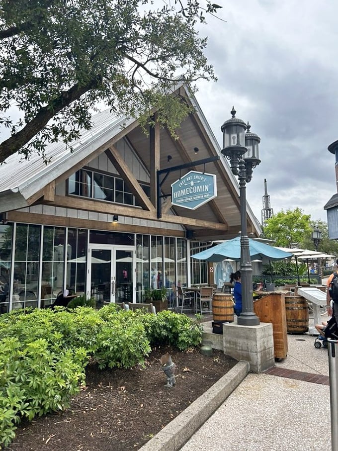 The pitched roof and wooden beams of Homecomin' aren't just architectural choices—they're a warm Southern hug before you even walk through the door.