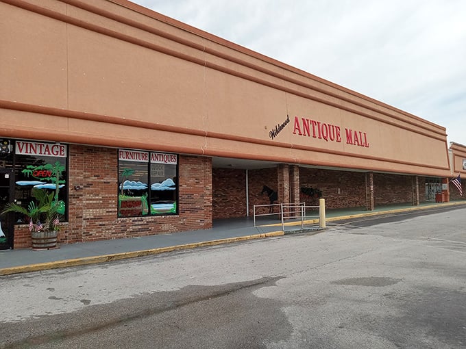 The unassuming exterior of Wildwood Antique Mall hides a treasure trove within – like finding out your quiet neighbor collects vintage motorcycles and Fabergé eggs.