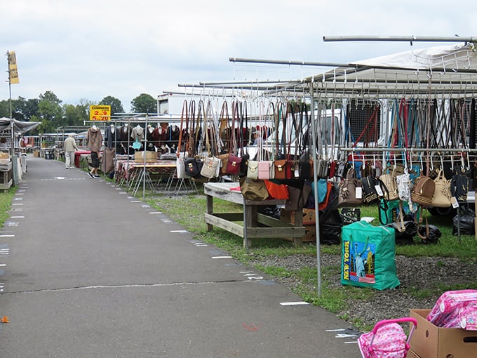 Rows of handbags and accessories stretch into the distance – a fashionista's treasure hunt where one person's castoff becomes another's statement piece.