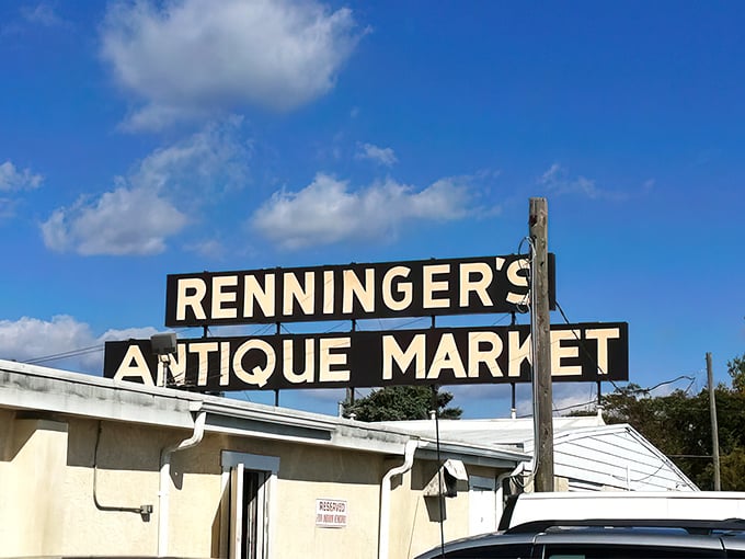 The iconic black and white sign stands against a perfect Pennsylvania sky, promising treasures that Amazon simply can't deliver.