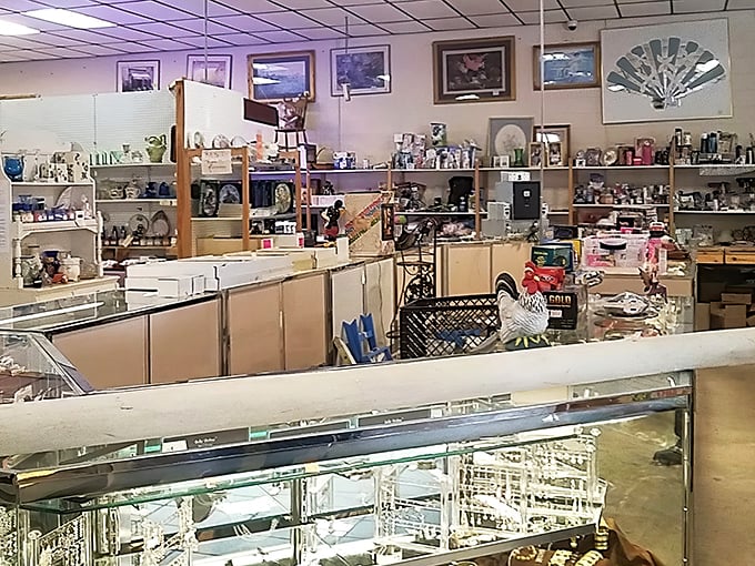 The unassuming yellow exterior of Treasures Indoor Flea Market promises adventure within—like finding the world's best taco stand in a gas station parking lot.