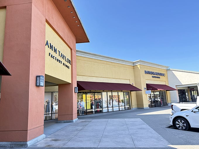 The Mediterranean-inspired façade of Ann Taylor welcomes shoppers like a warm hug from a friend who happens to have impeccable taste in blazers.