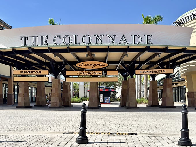 The grand entrance to retail therapy paradise, where your shopping dreams and budget nightmares collide under Florida sunshine.