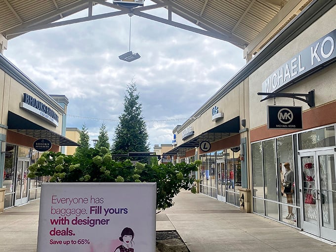 The modern entrance beckons with Calvin Klein and Adidas promising retail therapy at civilized prices.