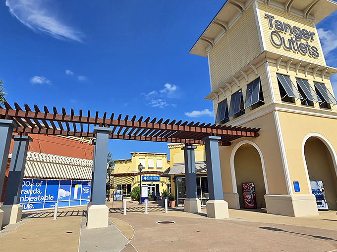 That Mediterranean-inspired entrance tower isn't fooling anyone – this is serious Texas shopping territory ahead.