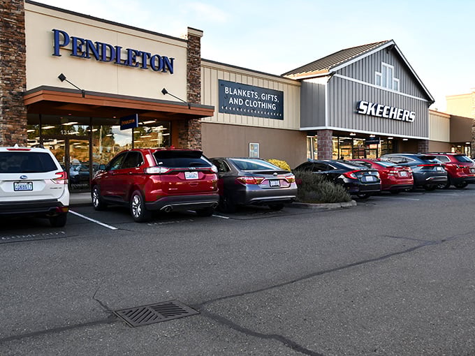 Pendleton and Skechers stand side by side like old friends, promising cozy blankets and comfortable footwear. The full parking lot tells the real story—savvy shoppers know where the deals live.